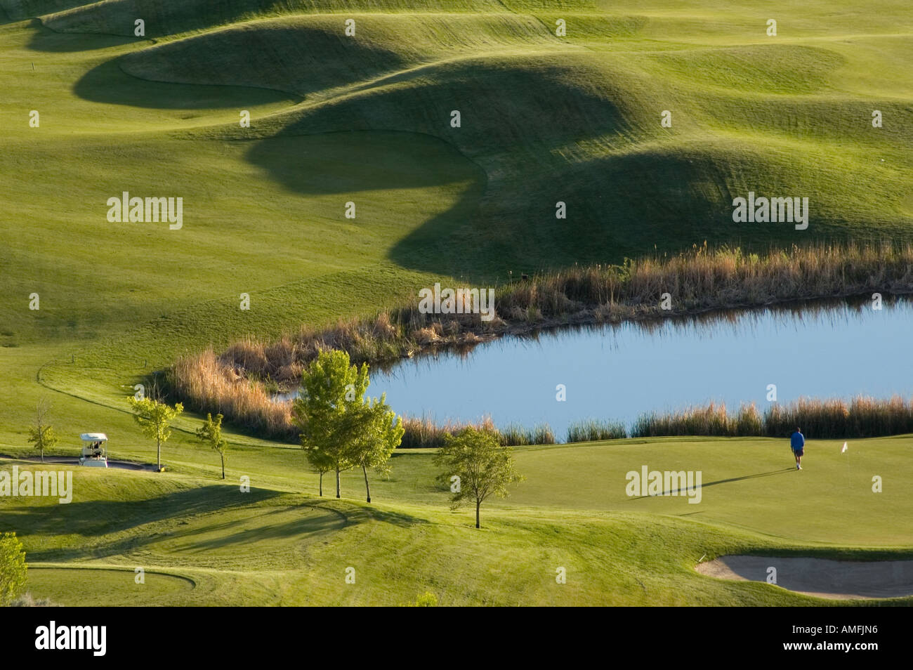 Golf course view sunset Stock Photo - Alamy