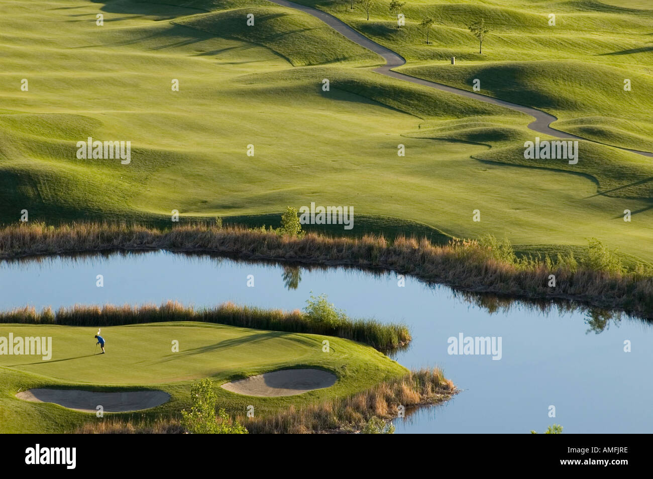 Golf course view sunset Stock Photo - Alamy