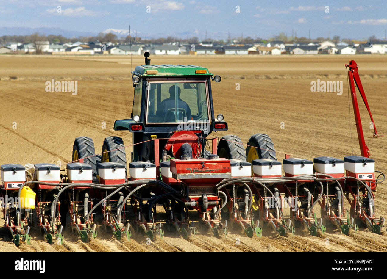 Tractor pulling corn planter hi-res stock photography and images - Alamy