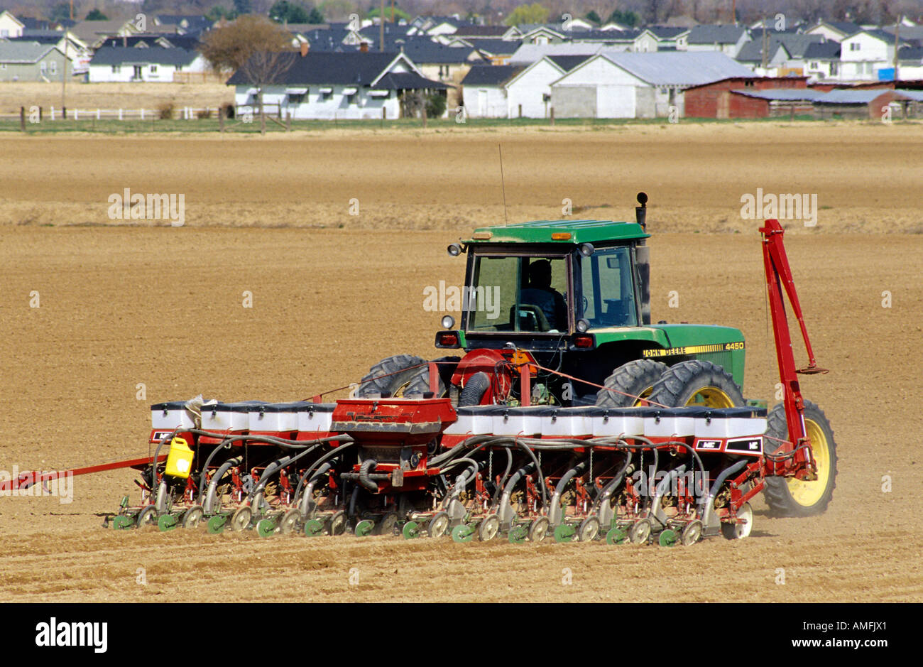 Tractor pulling corn planter hi-res stock photography and images - Alamy