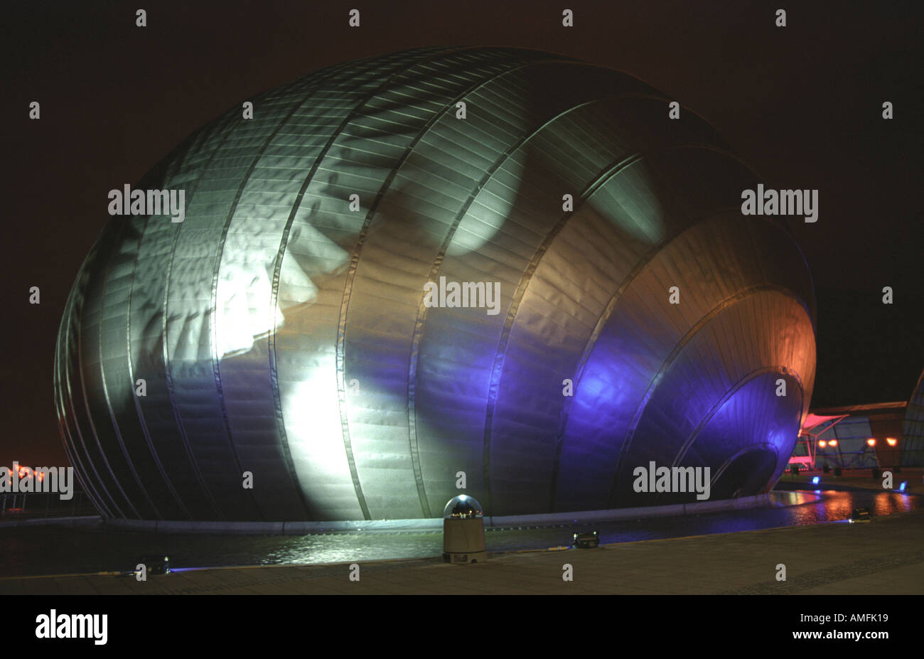 The IMAX cinema in Glasgow lit up at night Stock Photo - Alamy