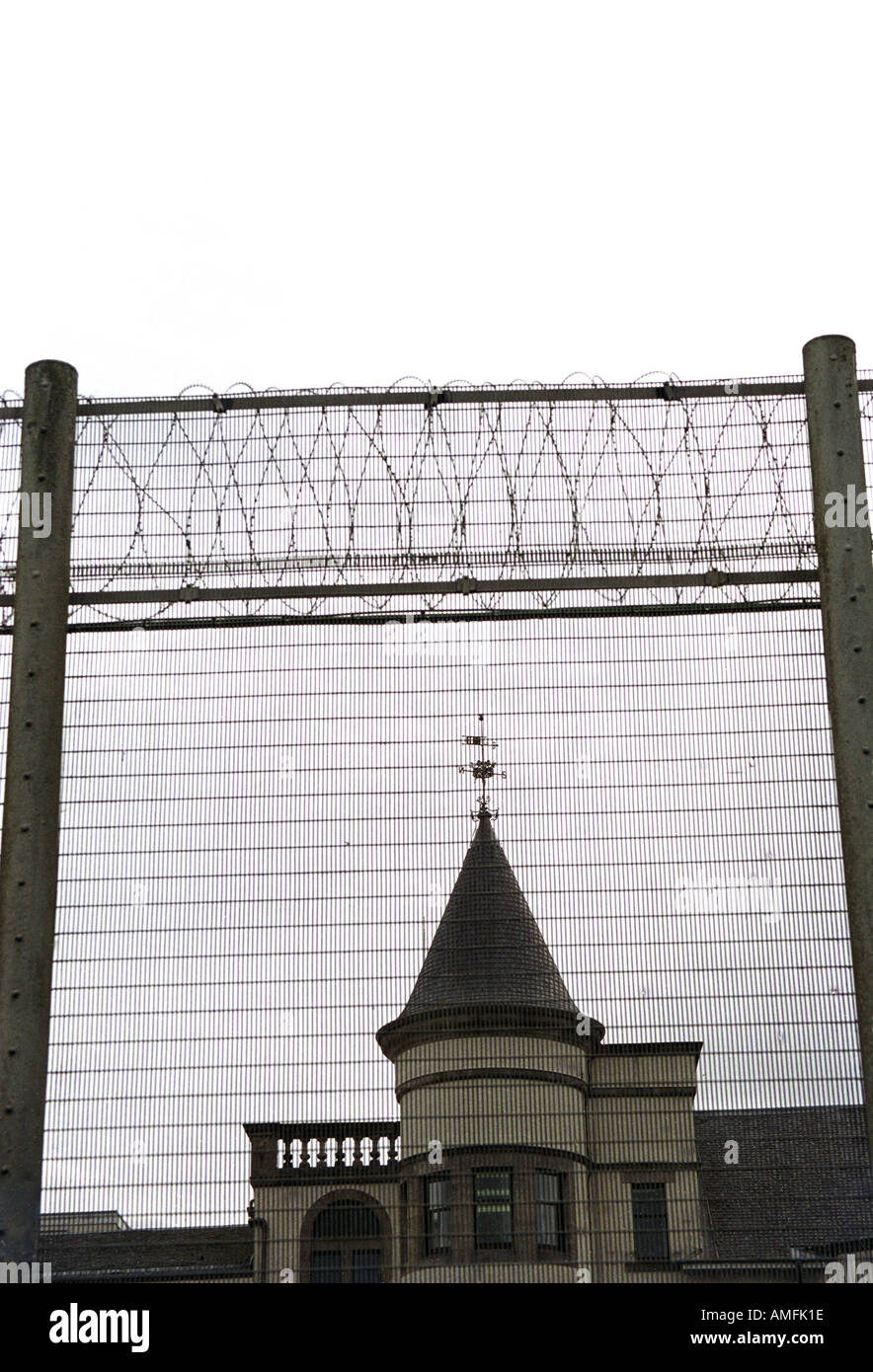 The high barbed wire fence that surrounds the Dungavel detention centre ...