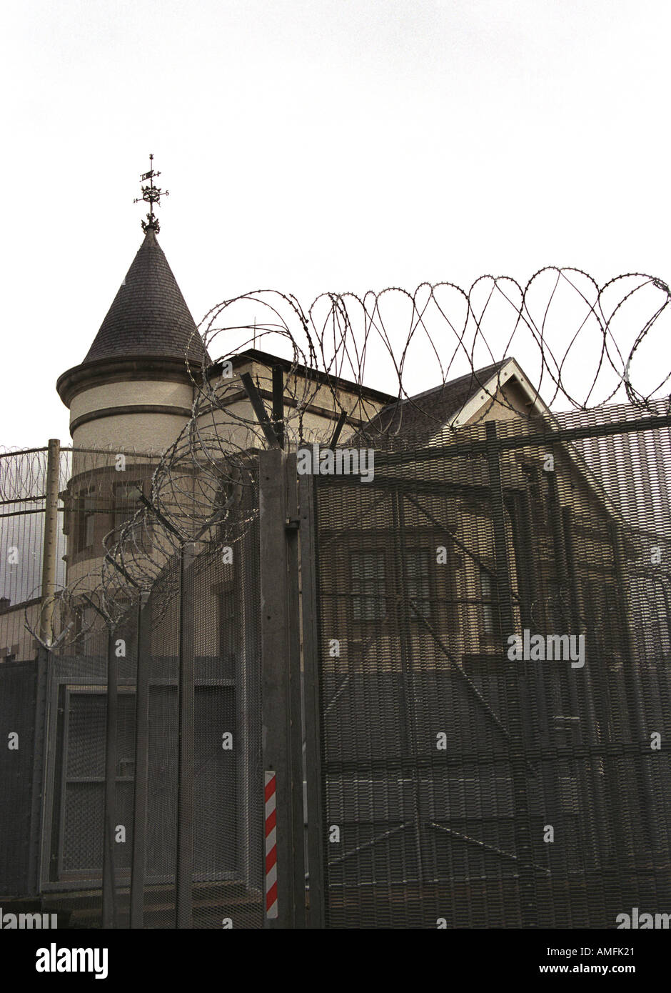 The high barbed wired security fence that surrounds the Dungavel ...