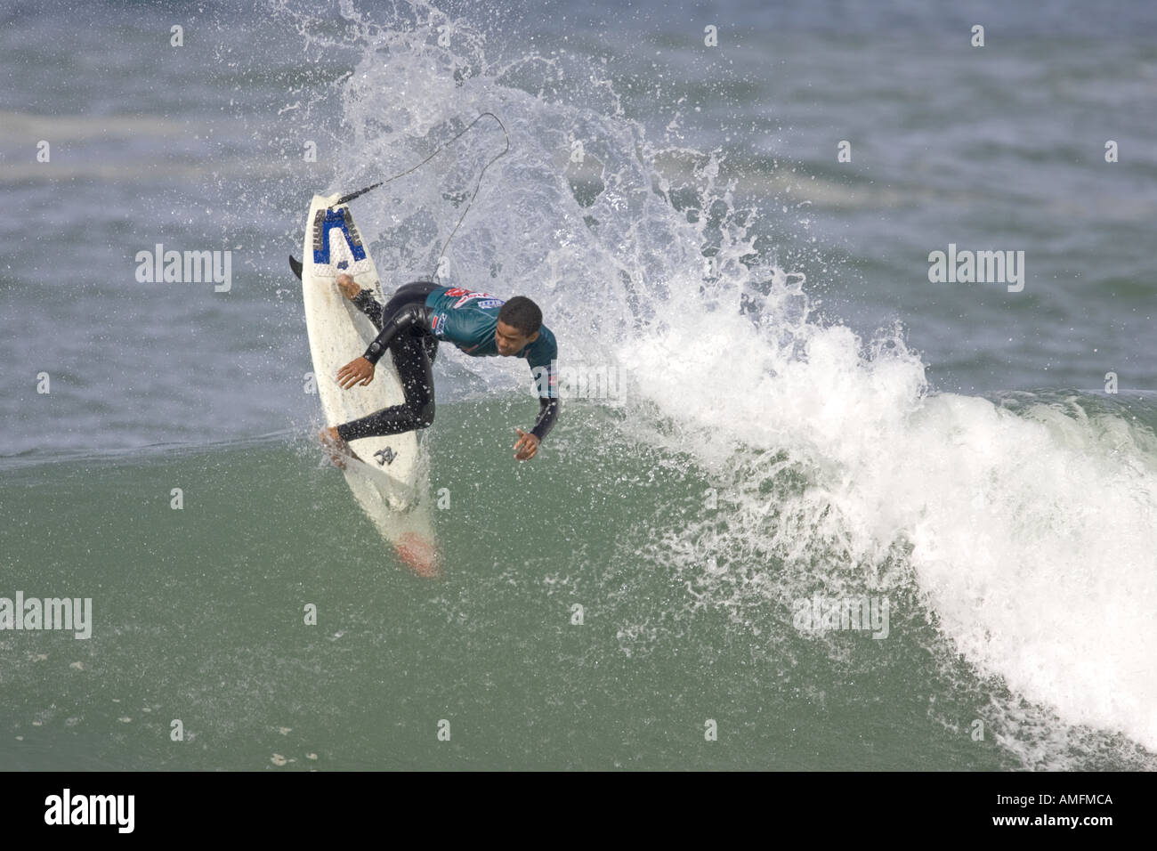 Surfer riding a Wave Stock Photo - Alamy