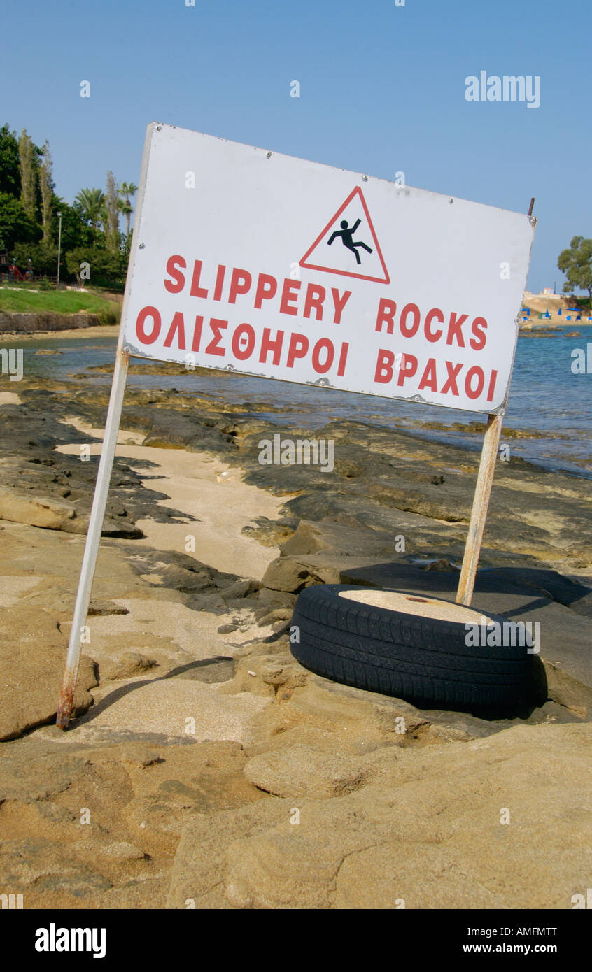 Slippery rocks warning sign hi-res stock photography and images - Alamy