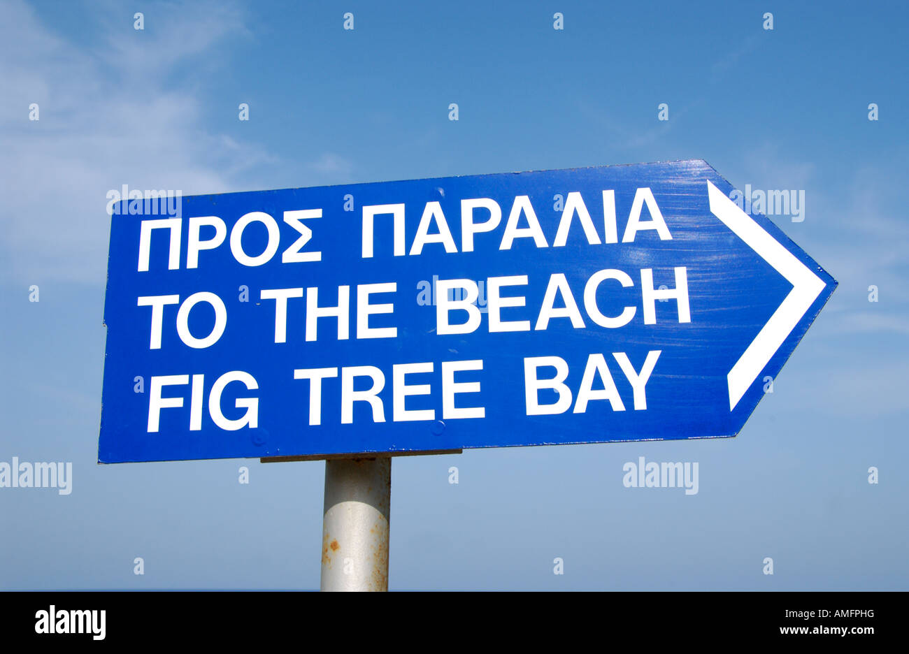 Cyprus beach. TO THE BEACH bilingual sign at Fig Tree Bay Protaras on ...