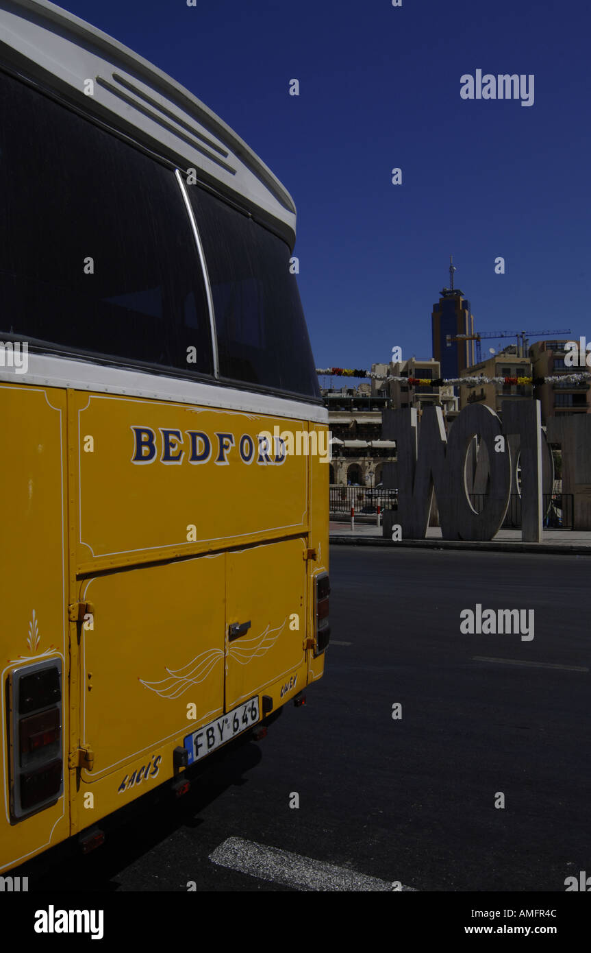Saint Julian s bay Malta bus yellow public transport Stock Photo - Alamy