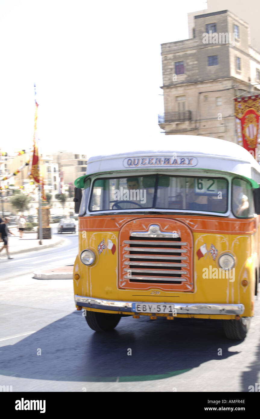 Saint Julian s bay Malta bus yellow public transport Stock Photo - Alamy