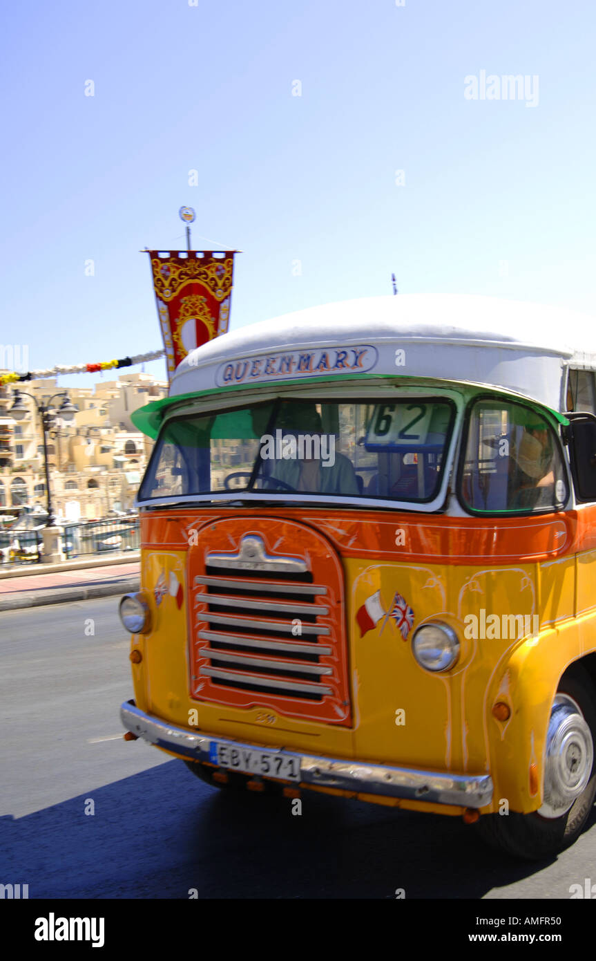 Saint Julian s bay Malta bus yellow public transport Stock Photo - Alamy