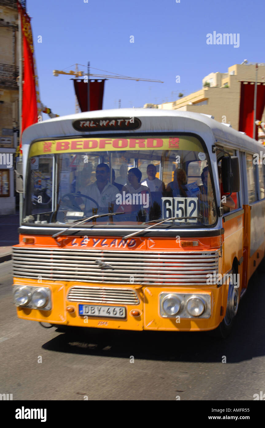 Saint Julian s bay Malta bus yellow public transport Stock Photo - Alamy