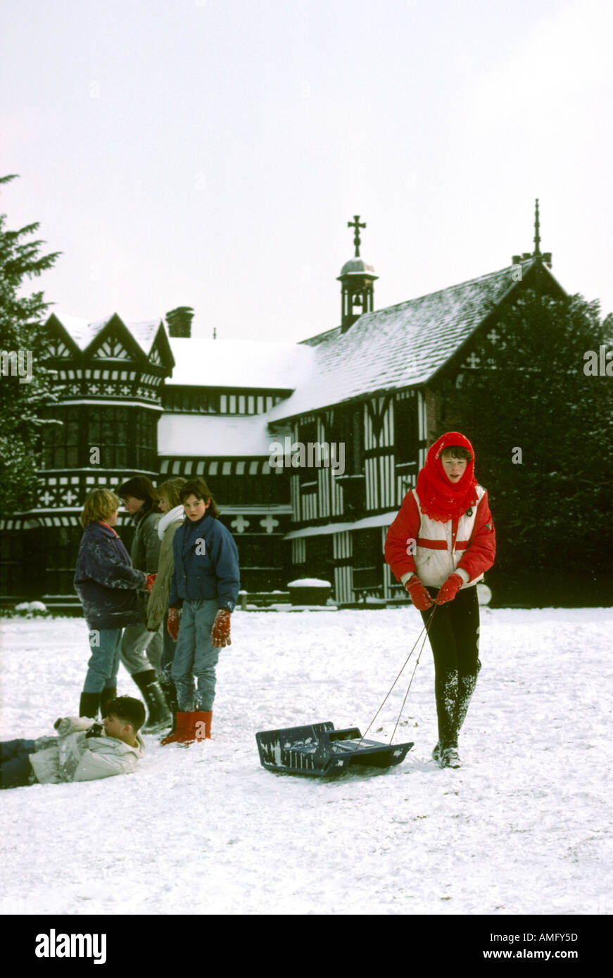 Cheshire Stockport Bramhall Bramall Hall in winter children sledging ...