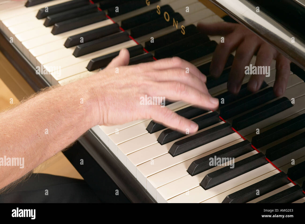 close up of concert pianist hands playing grand piano Stock Photo - Alamy