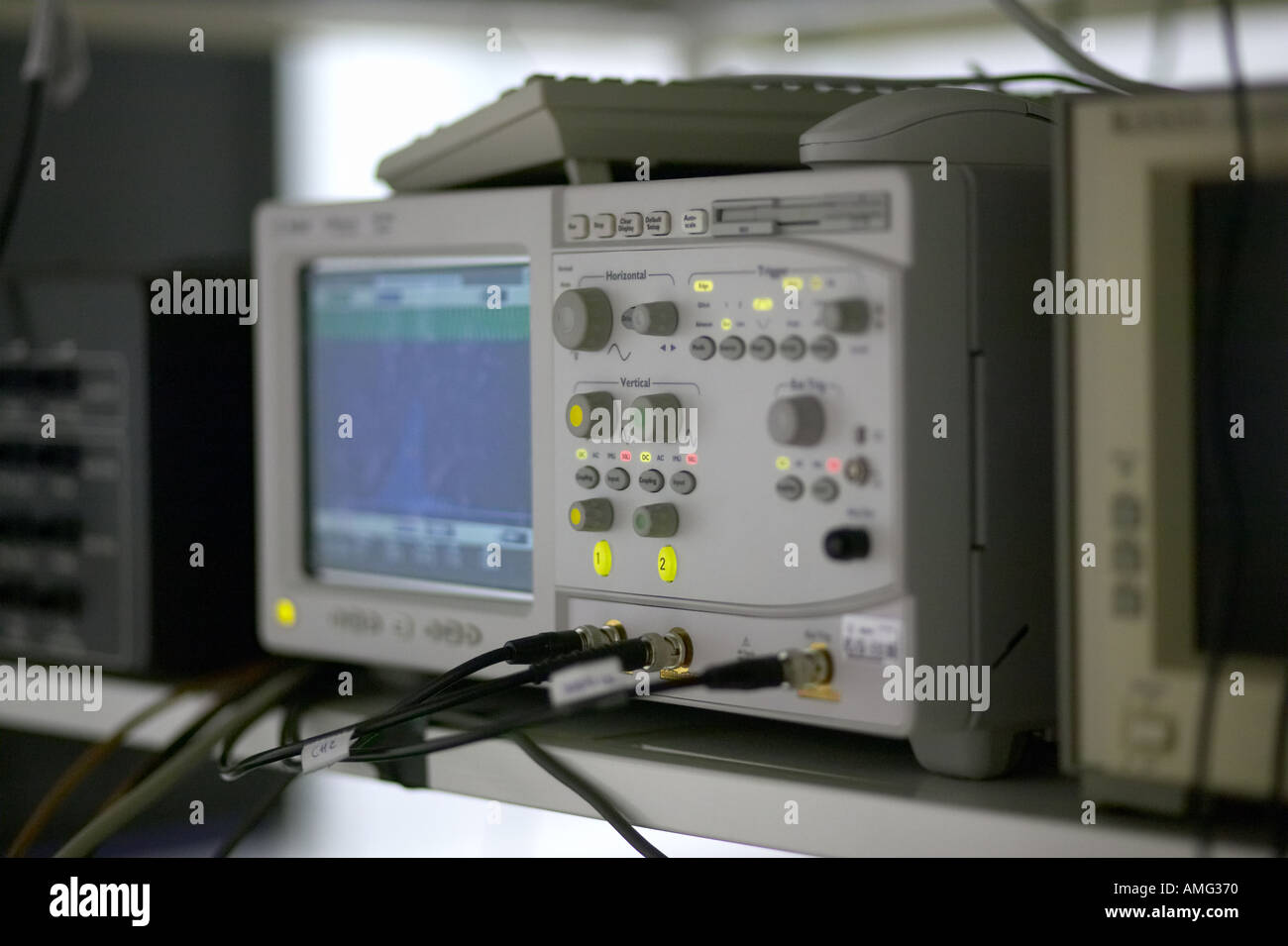close up of oscilloscope measuring output from industrial laser Stock ...