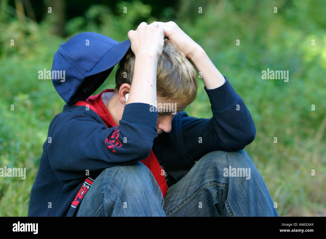 portrait of a sad young boy Stock Photo - Alamy