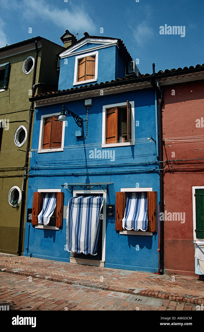 Blue painted house, typical of island of Burano, Burano, Venice, Italy ...