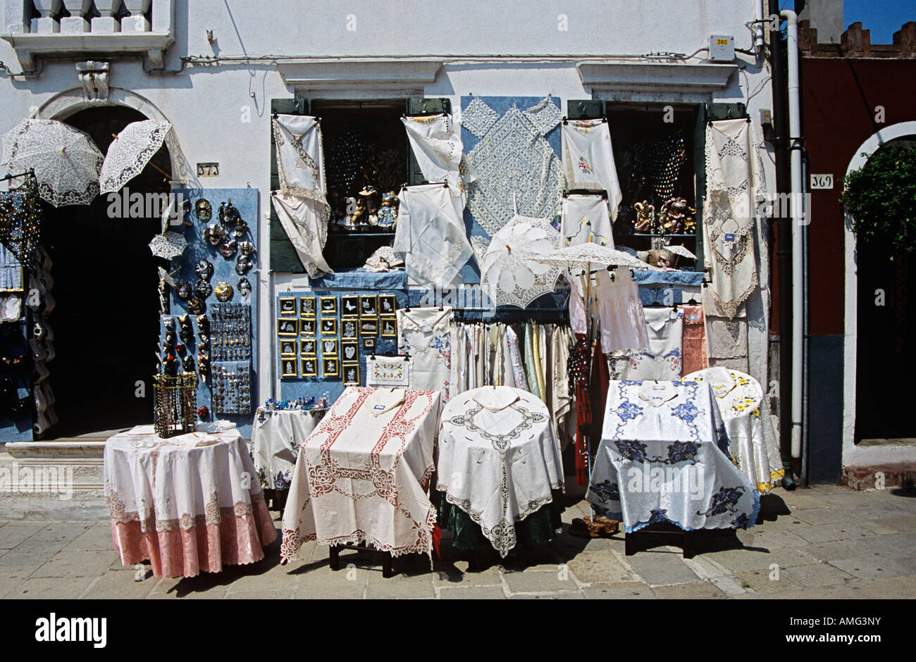 Lace gifts and souvenirs for sale outside a shop on the island of Burano, Venice, Italy Stock ...