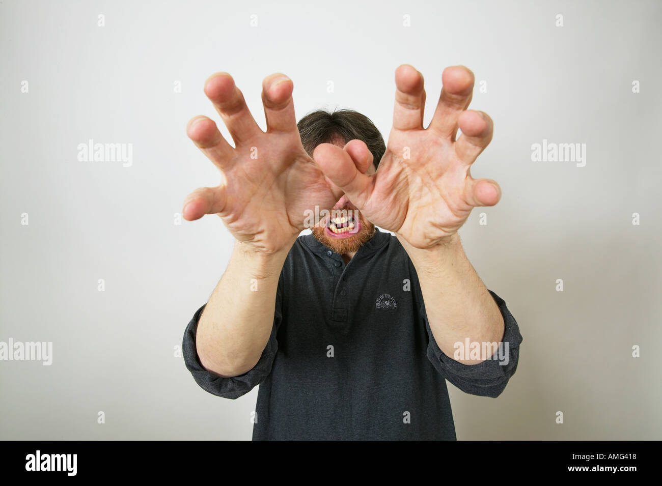 mans hands coming towards to strangle murder Stock Photo - Alamy