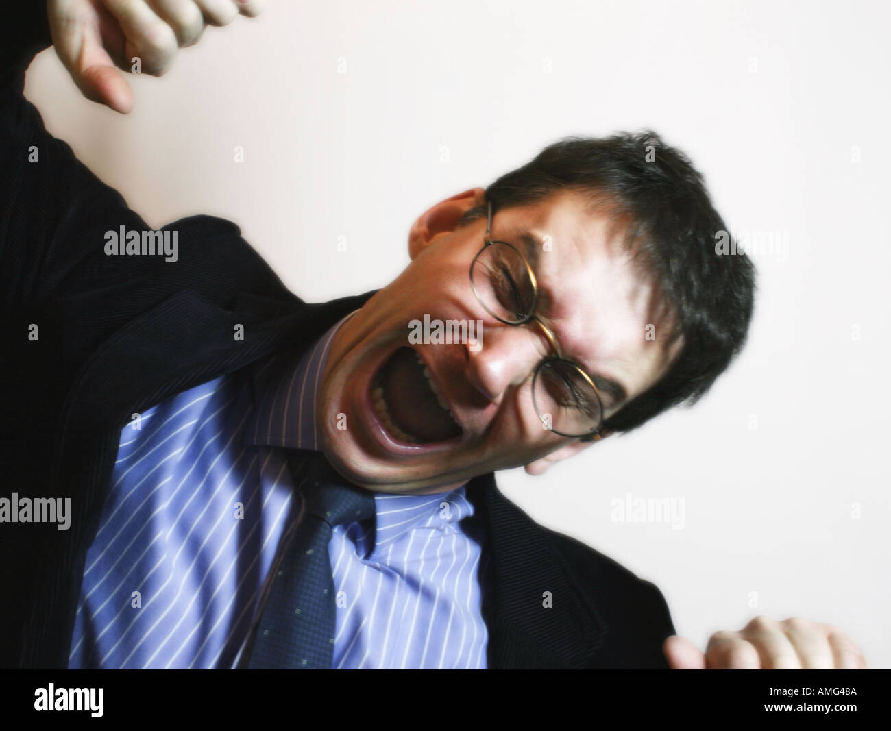 Young business man under stress Stock Photo - Alamy