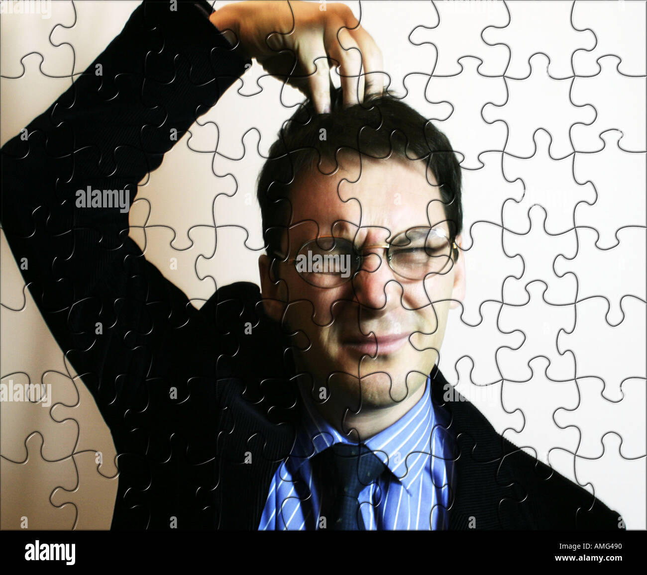 Puzzled business man Stock Photo - Alamy