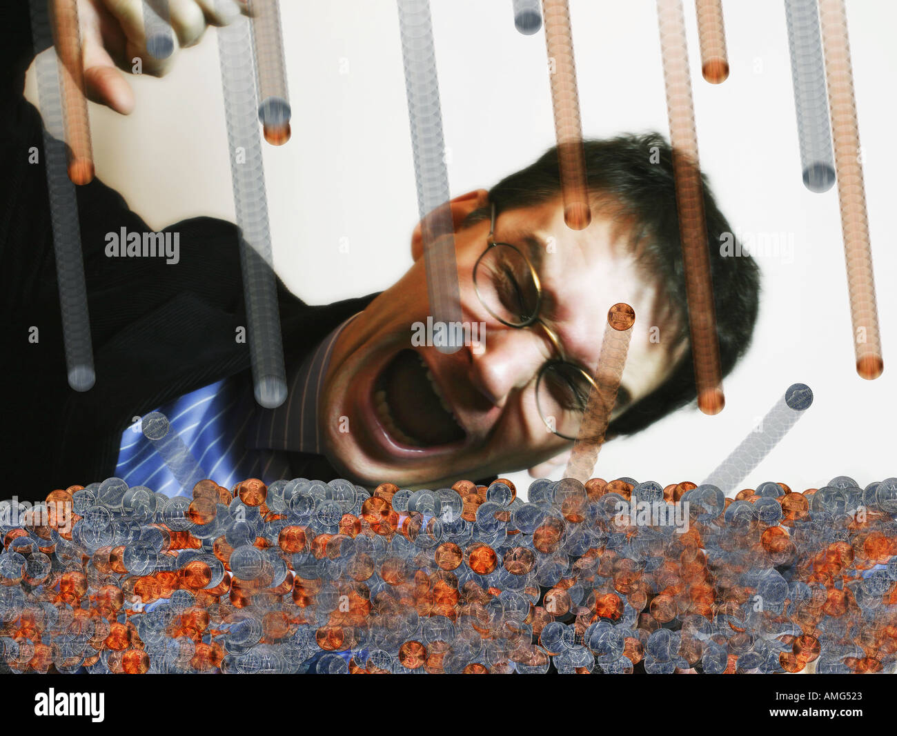 Conceptual image showing businessman being swamped by cash raining down ...