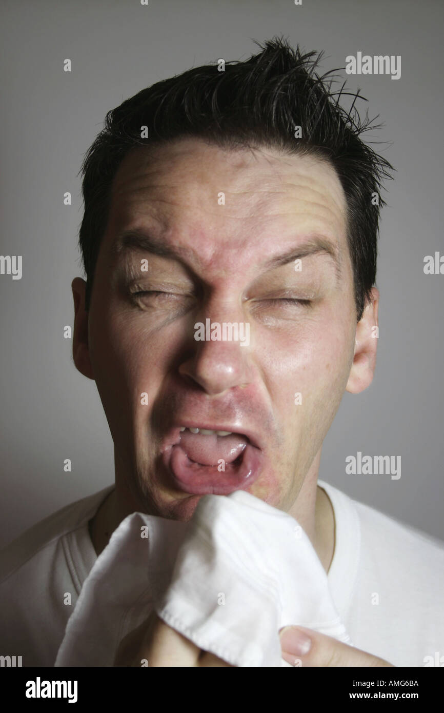 Hanky handkerchief tissue sneezing hi-res stock photography and images ...