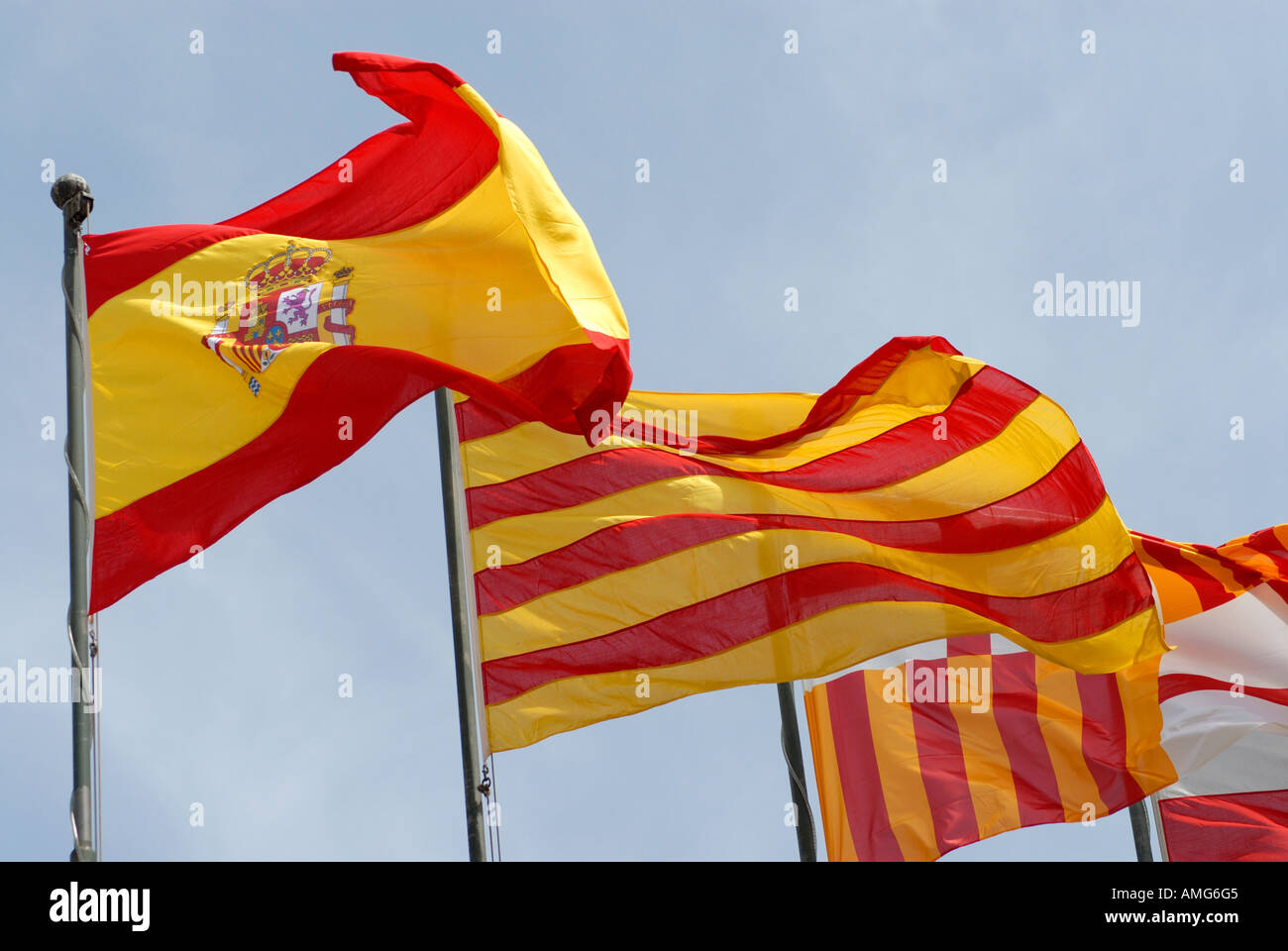Spanish and regional flags flying in Barcelona Stock Photo - Alamy