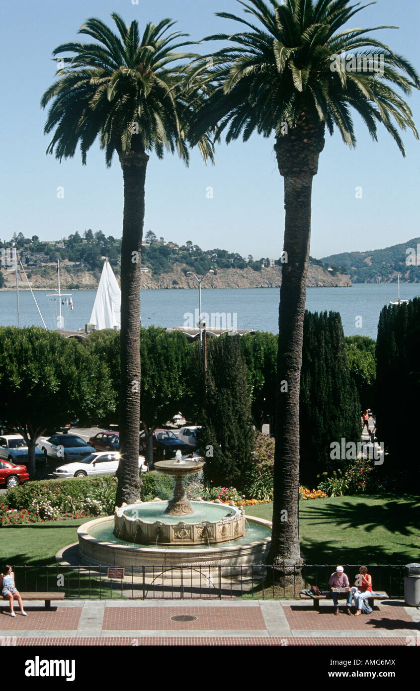 View of fountain, palm trees and the sea, Sausalito, near San Francisco ...