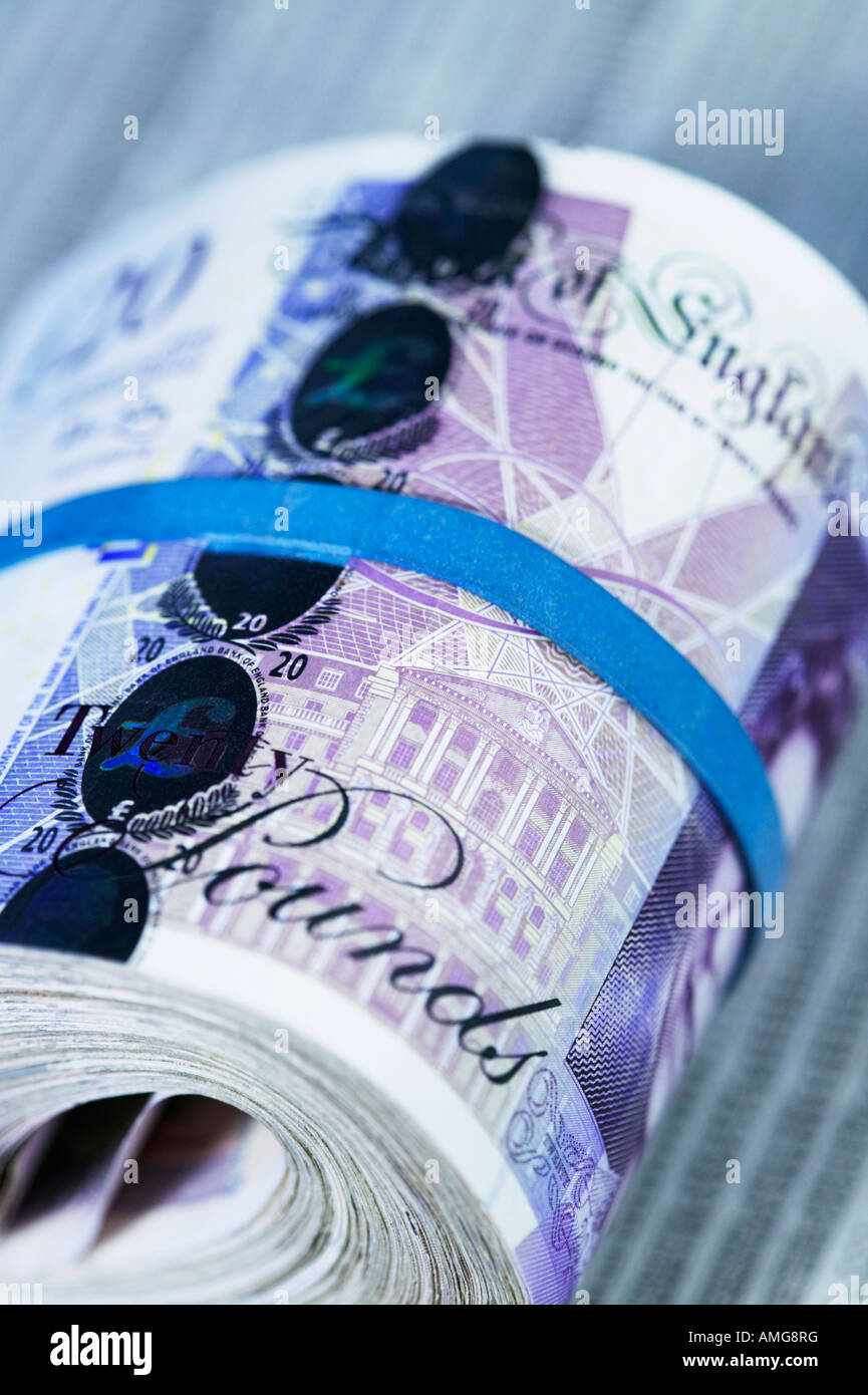 Roll of twenty pound notes hi-res stock photography and images - Alamy