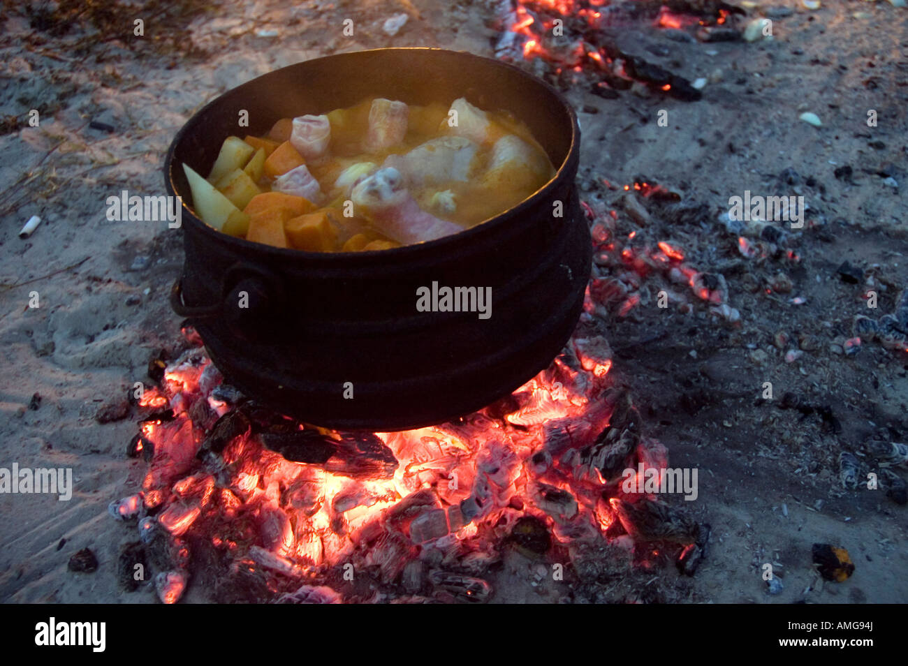 Cooking on an open fire a small caldron on an outdoor wood fire Stock ...