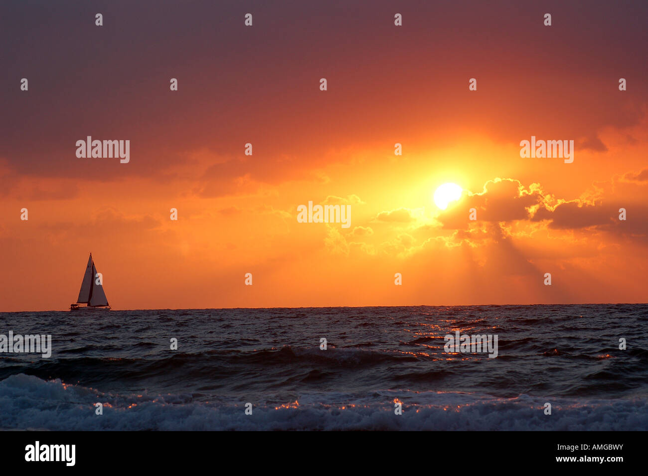 Mediterranean Sun Set A sail boat crossing the sun A sequence of 4 ...