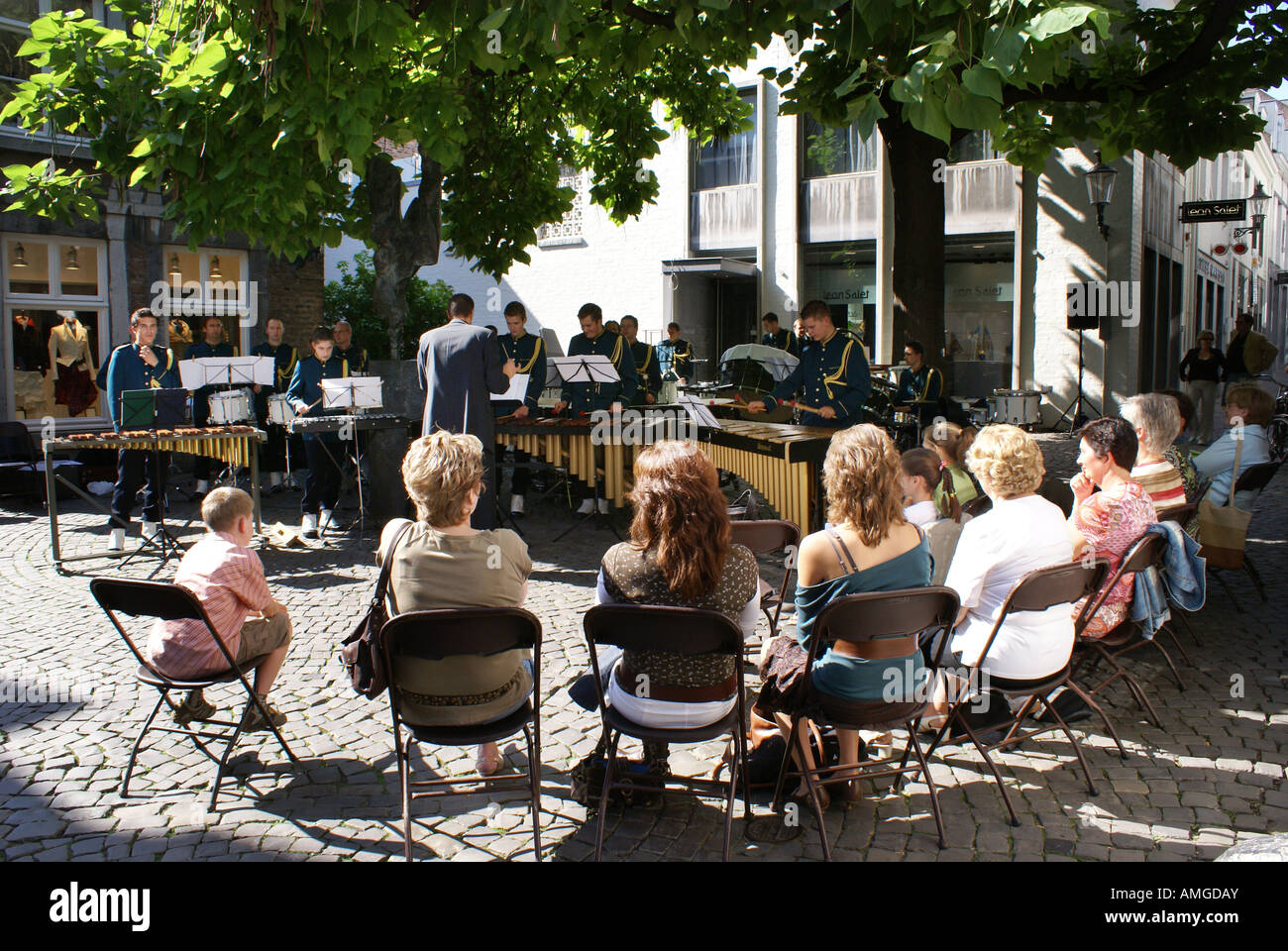 spectators watching muscial band doing an outdoor concert Maastricht ...