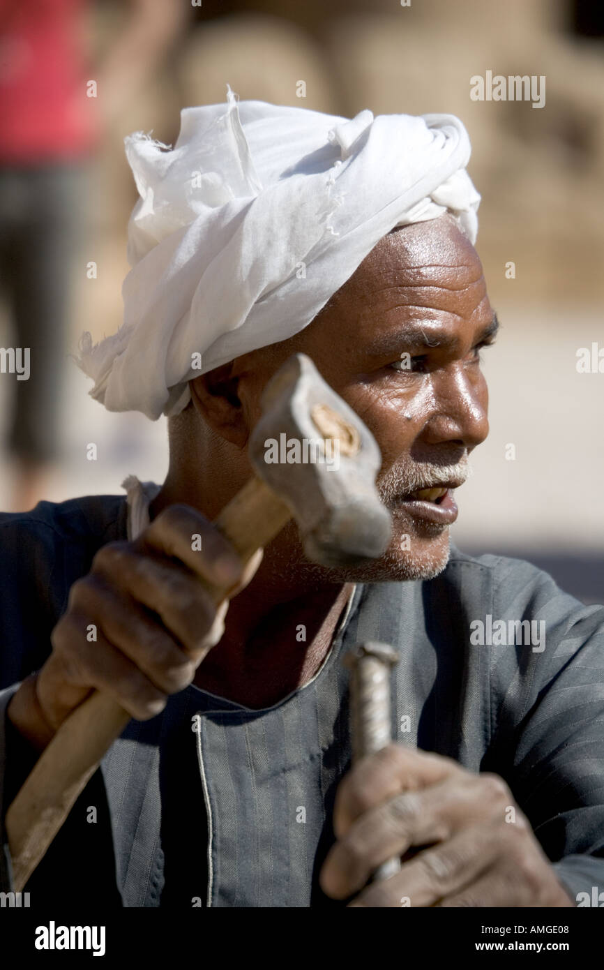 Stone Worker at Karnak Temple Stock Photo - Alamy