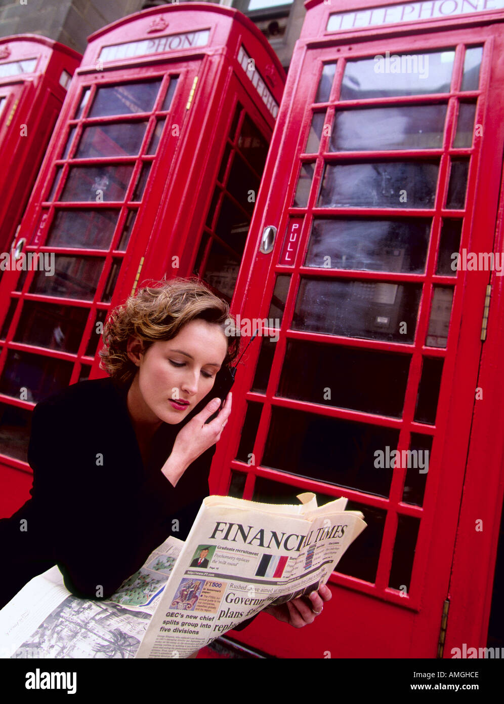 Woman and phonebox hi-res stock photography and images - Alamy