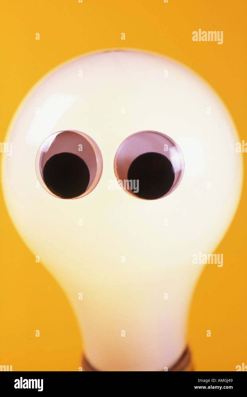 Incandescent light bulb with eyes Stock Photo - Alamy