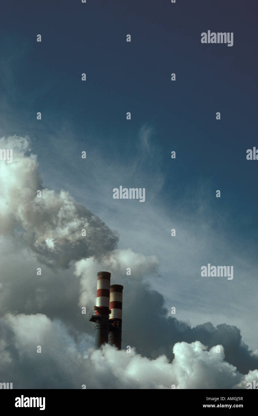 industrial paper pulp manufacturing plant billowing smoke stacks Stock ...