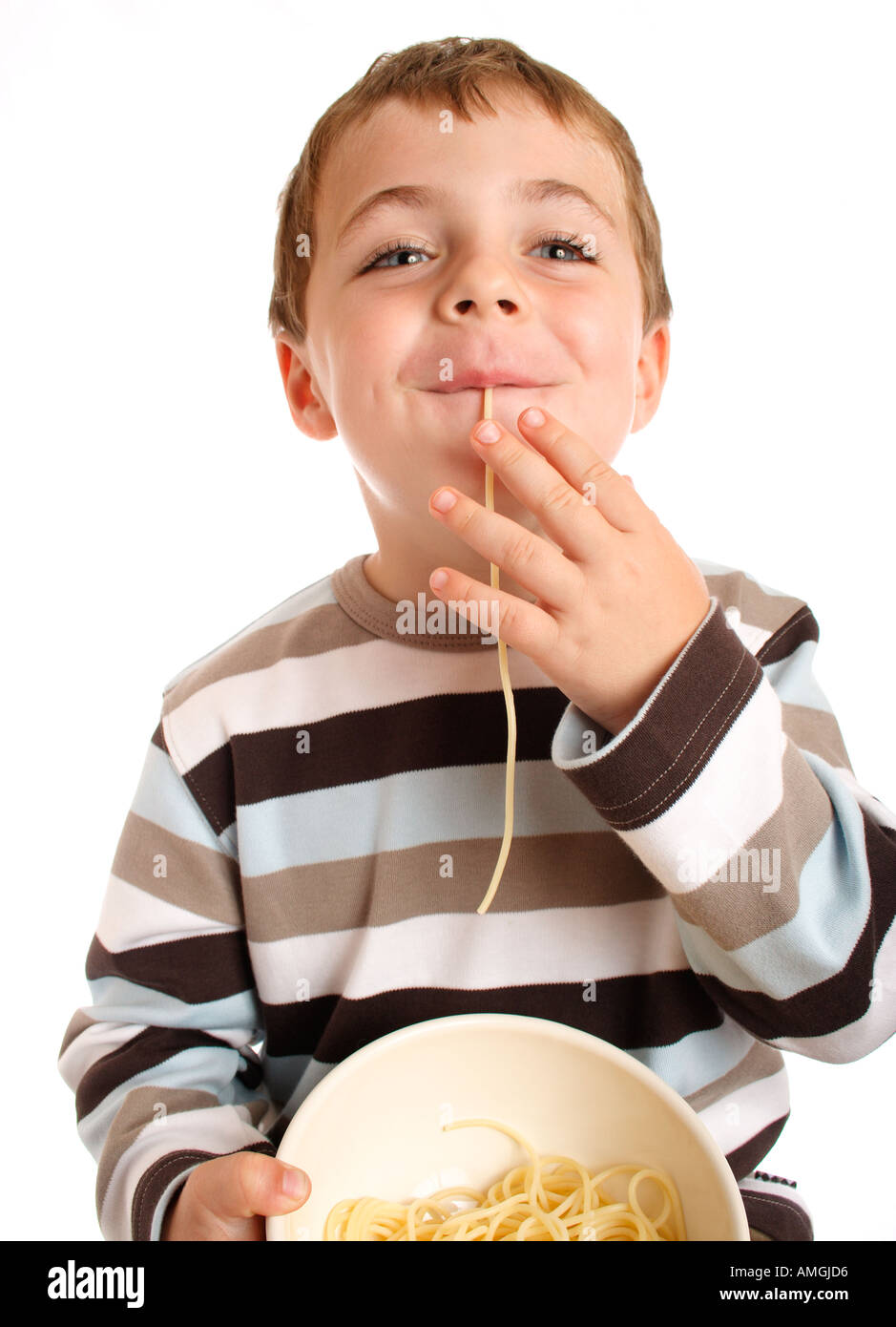 little boy eating spaghetti from a bowl Stock Photo - Alamy
