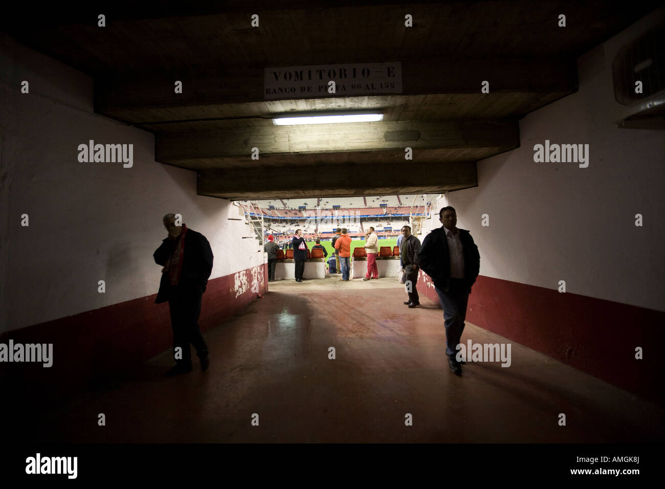 People going through a stadium gate Stock Photo - Alamy