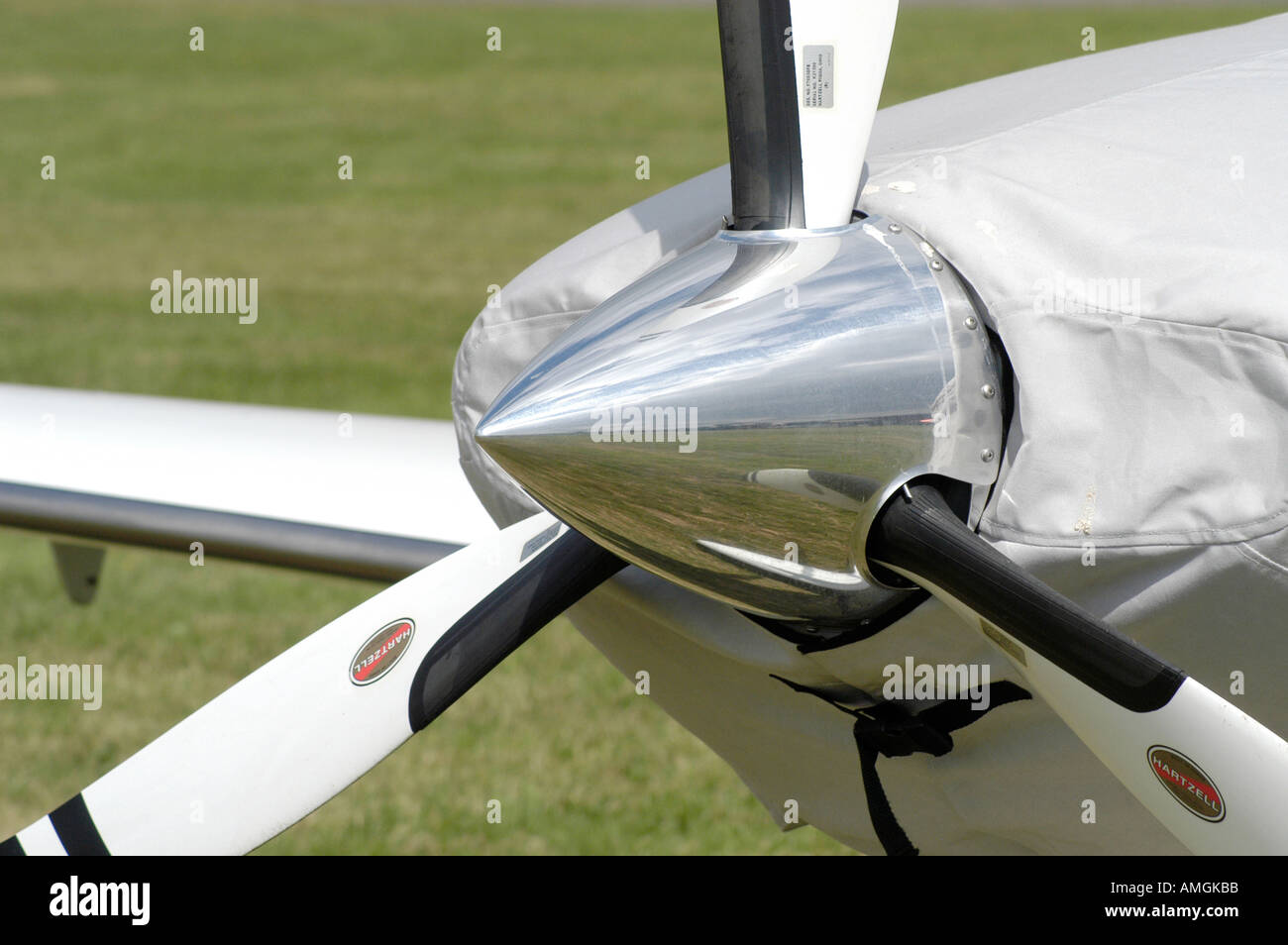 nose cone spinner of light aircraft parked on airfield Stock Photo - Alamy