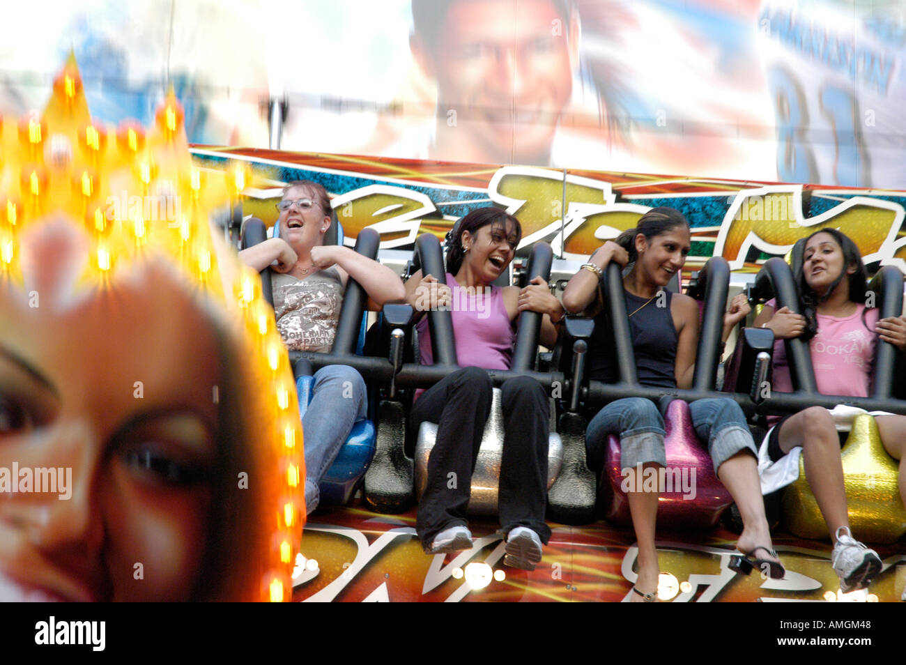 Kids having fun on the fairground rides hi-res stock photography and ...