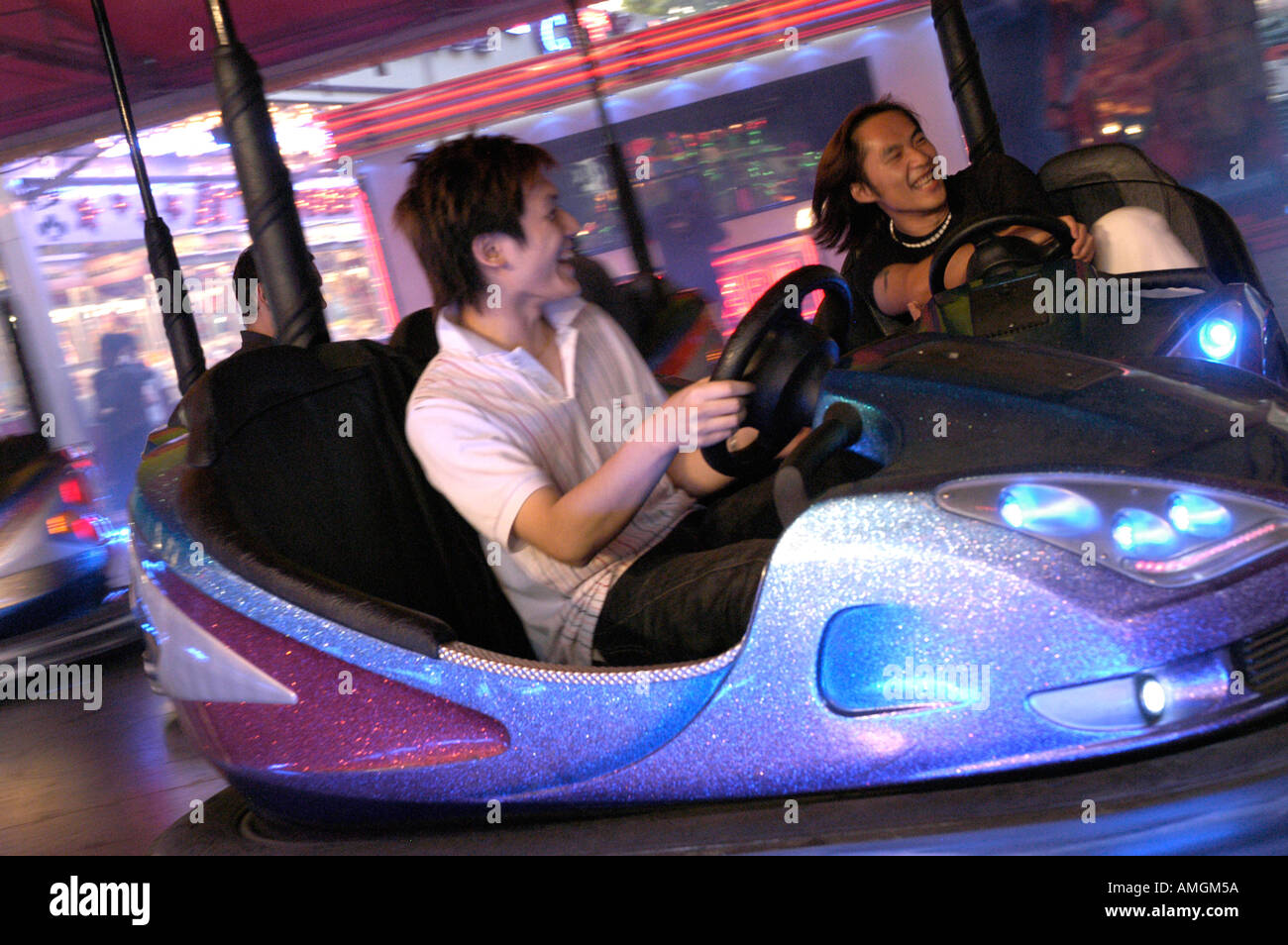 Fun on the dodgems Stock Photo - Alamy