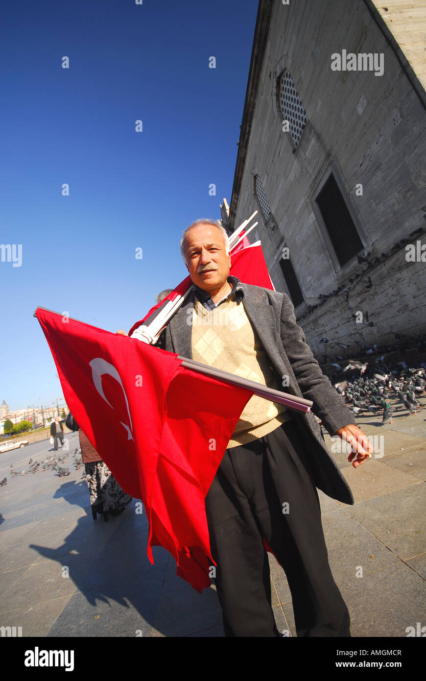 ISTANBUL Man selling Turkish flags by the Yeni ('New') Mosque on the ...