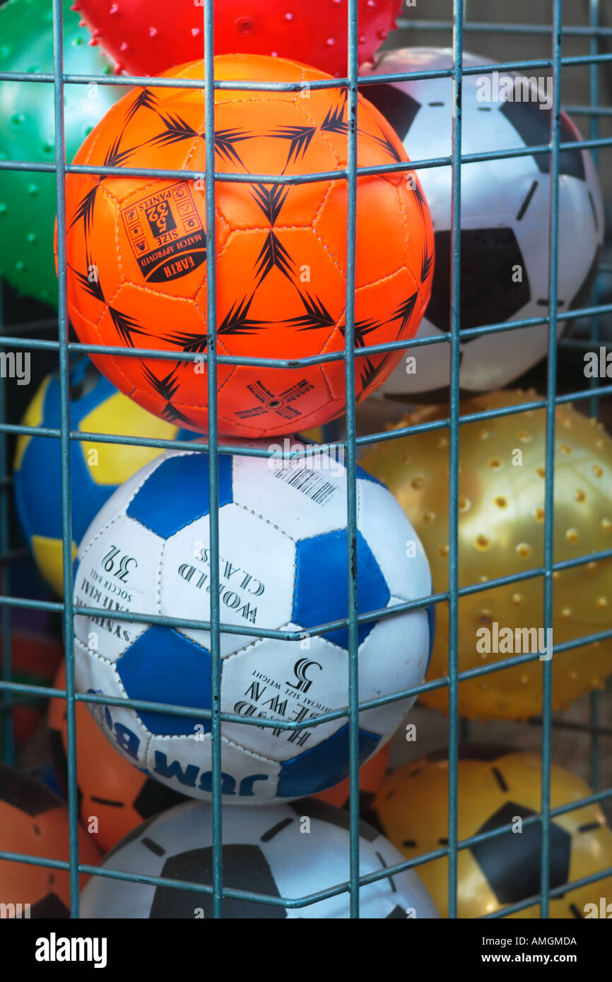 Vertical shot of colourful footballs ball Stock Photo - Alamy