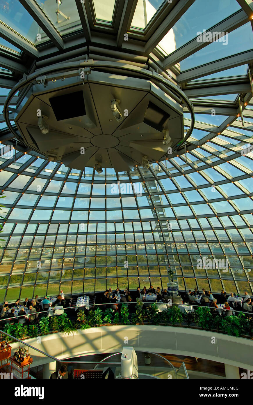 People in Perlan restaurant building atop water tanks with natural hot ...