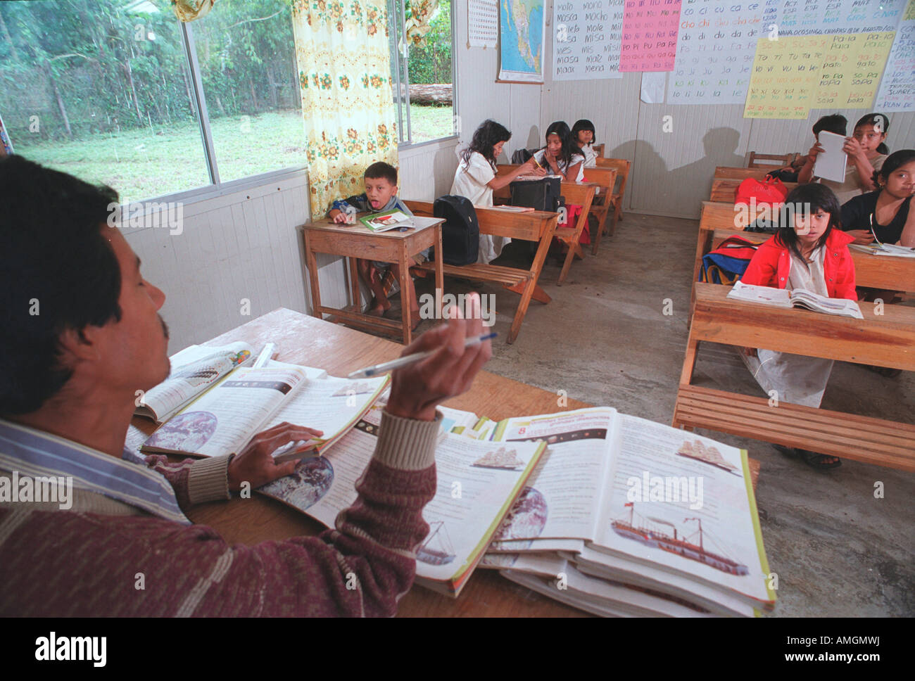 Mexico, Chiapas, Lacandon Mayan indian school children looking bored ...