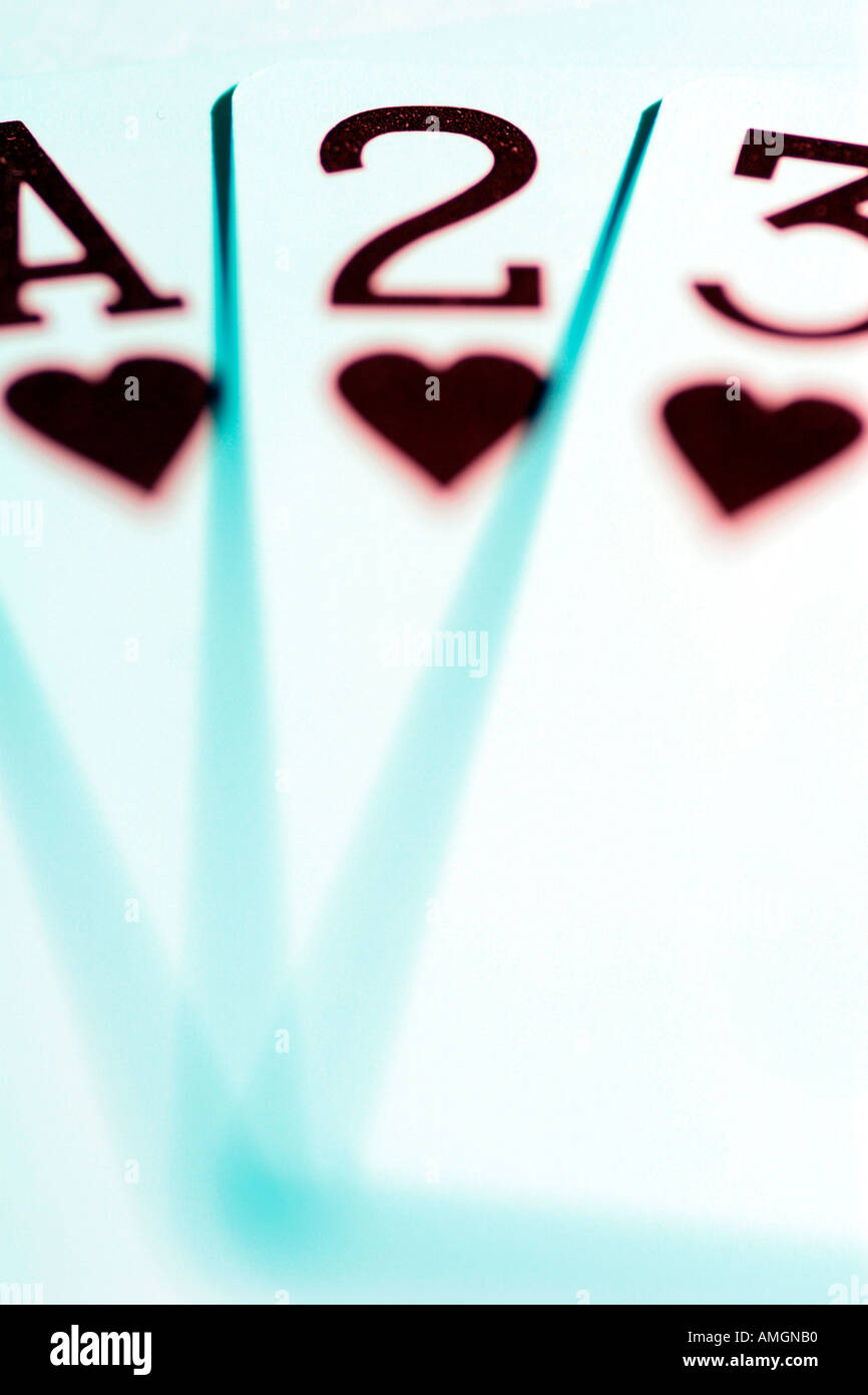ace two three of hearts playing cards blue tint Stock Photo - Alamy