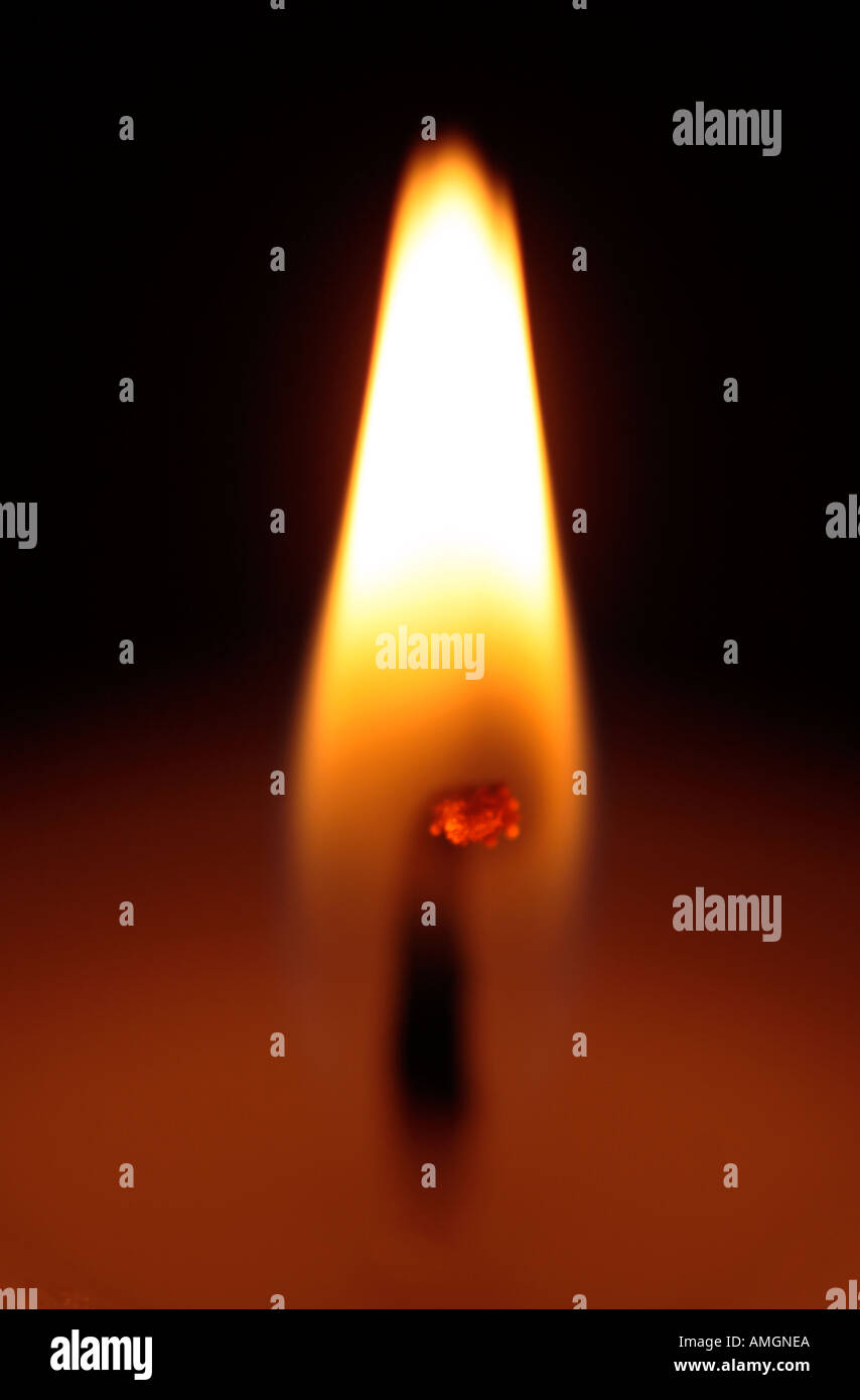 Vertical Close up of candle flame Stock Photo - Alamy