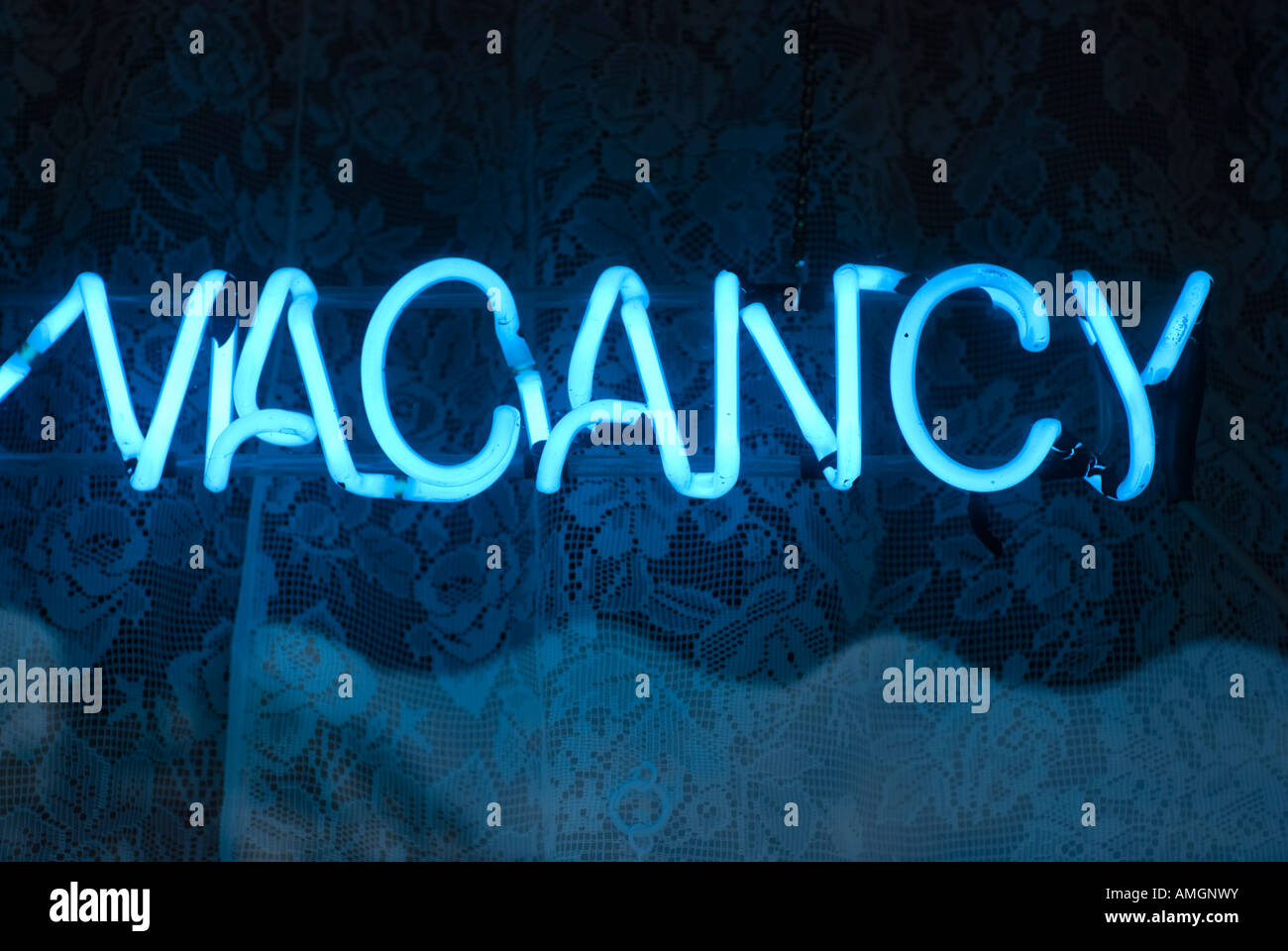 Vacancy sign lit in the window of a hotel in downtown Silverton ...