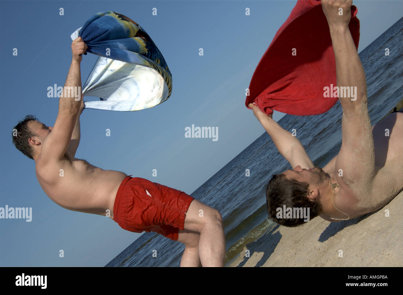 two men at the seaside Stock Photo - Alamy