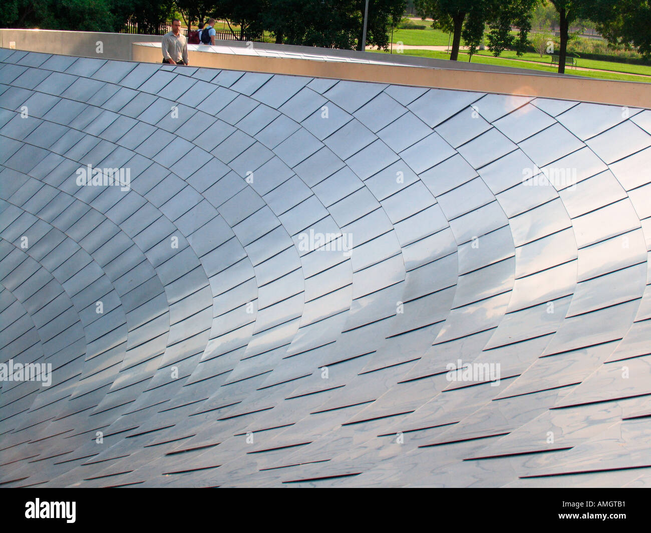 Pedestrians walk on BP Bridge Millennium Park Chicago Illinois USA ...