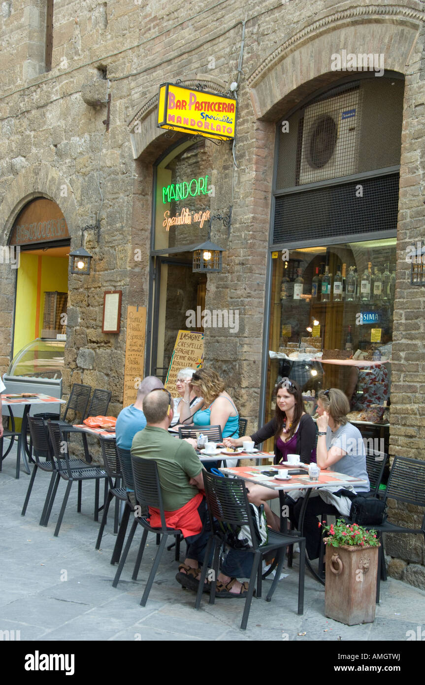 People eating outside a small Italian Cafe Stock Photo - Alamy